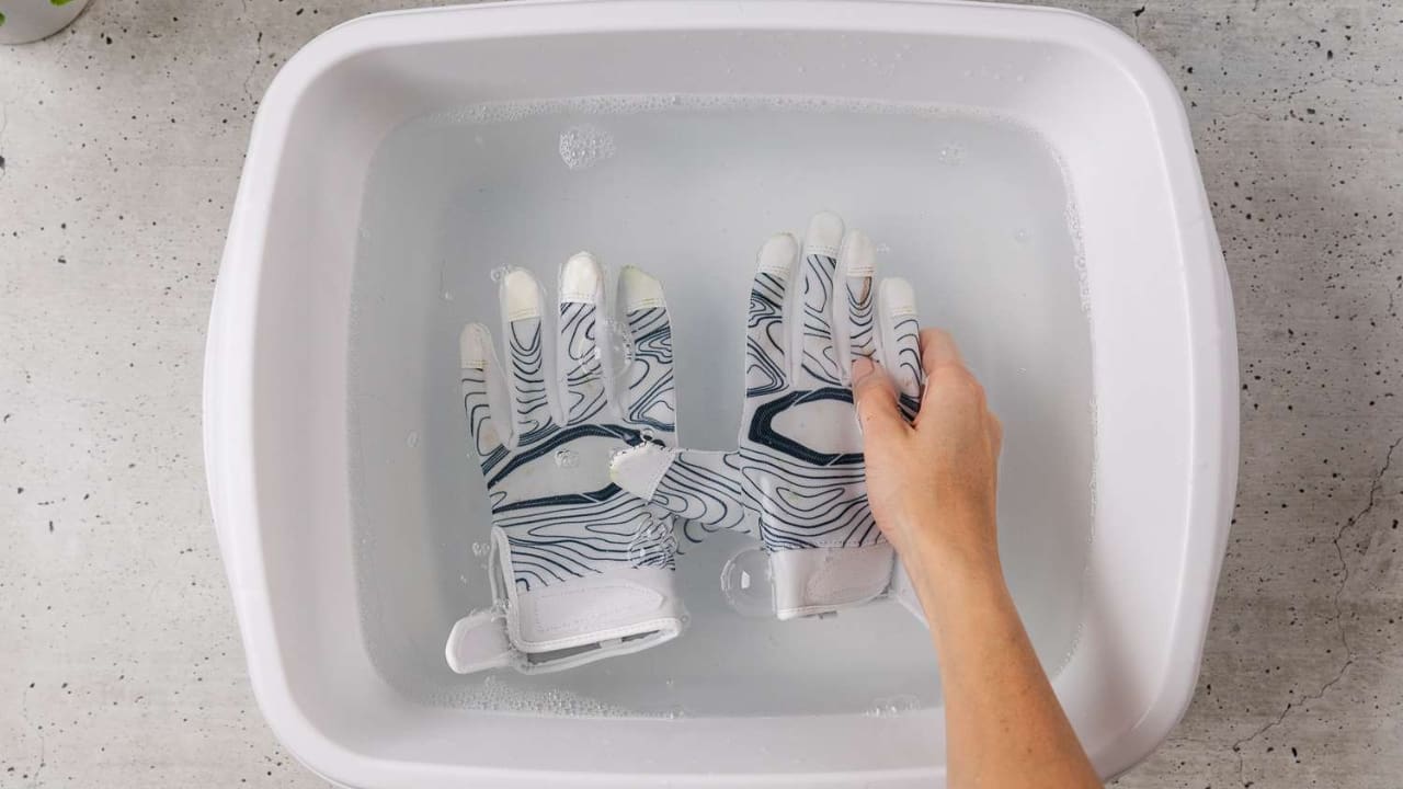 Can You Put Football Gloves in the Washing Machine? - Surprise Sports